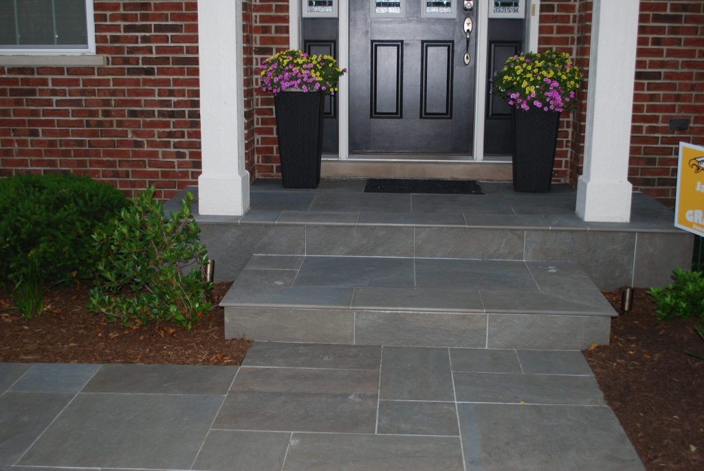 Custom concrete overlay with porcelain tile - All Property Services